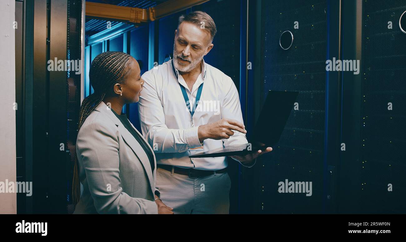 Lets shutdown this system and start all over again. two technicians ...