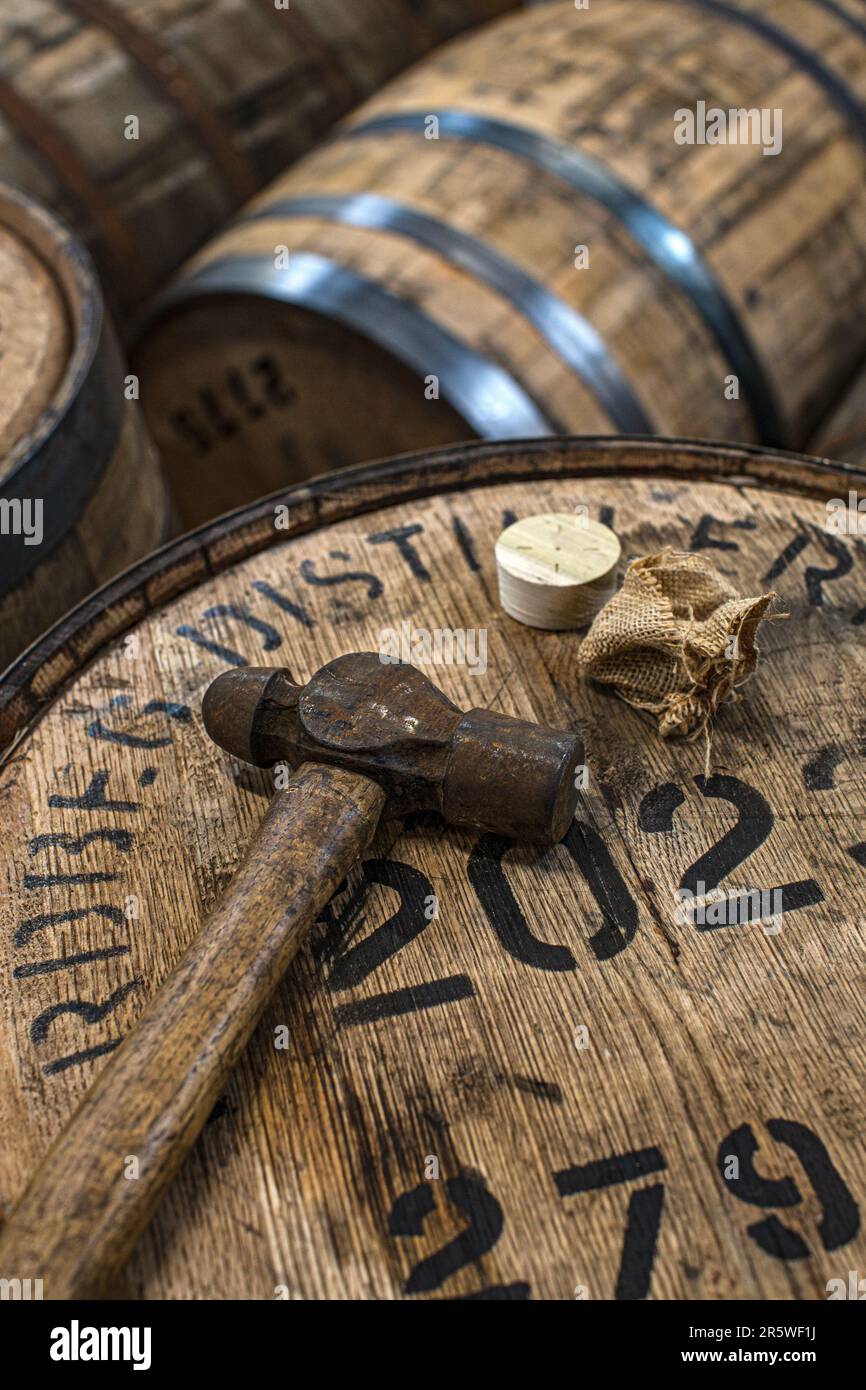 Hammer with whiskey barrel bung at Ardbeg Distillery, Isle of Islay ...