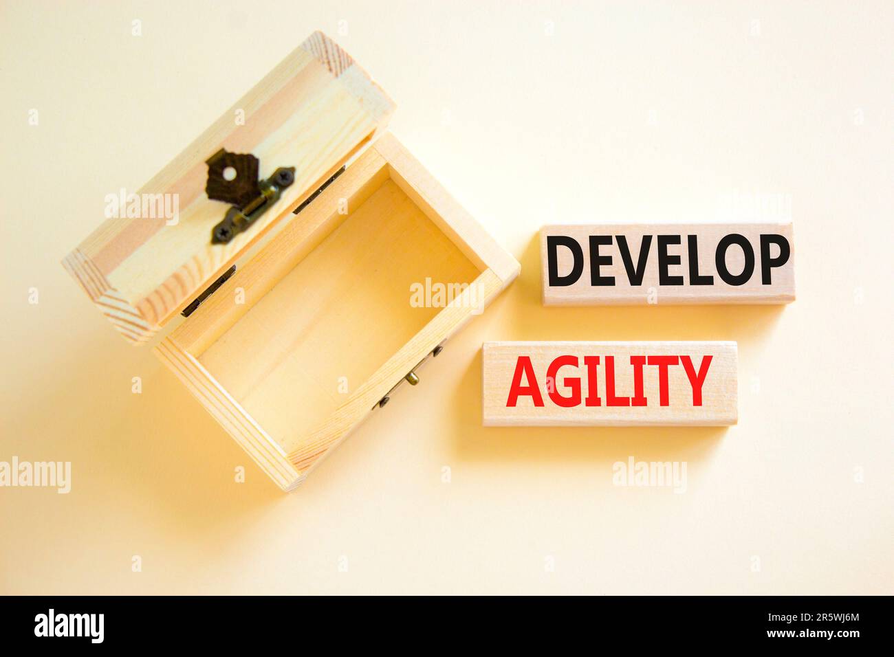Develop agility symbol. Concept words Develop agility on wooden blocks ...