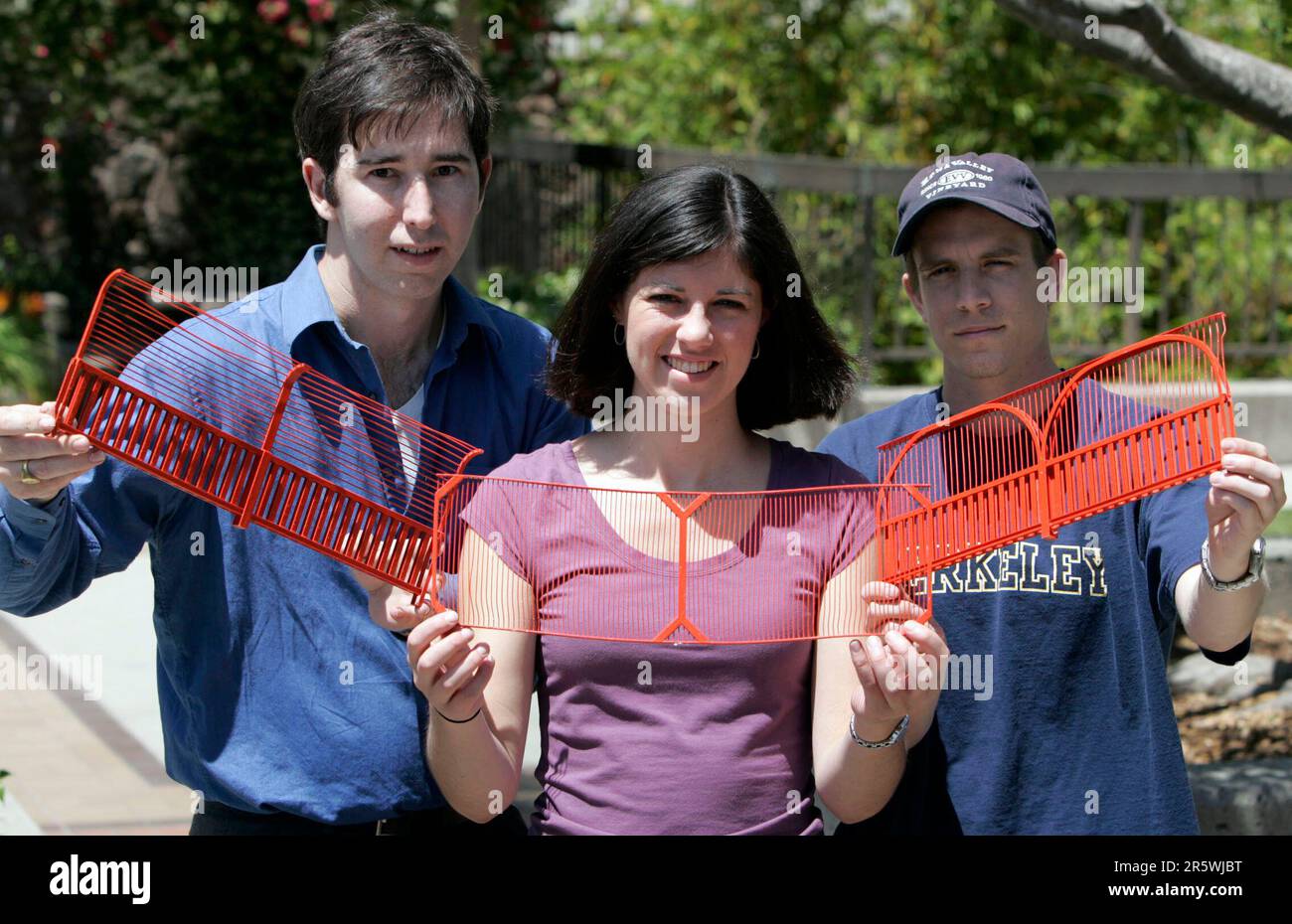 suicide26 024 pc.jpg From left, Ryan Stauffer holds a scale model of ...