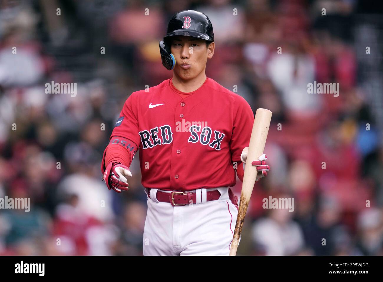 Boston Red Sox's Masataka Yoshida heads back to the dugout after striking out against Tampa Bay ...