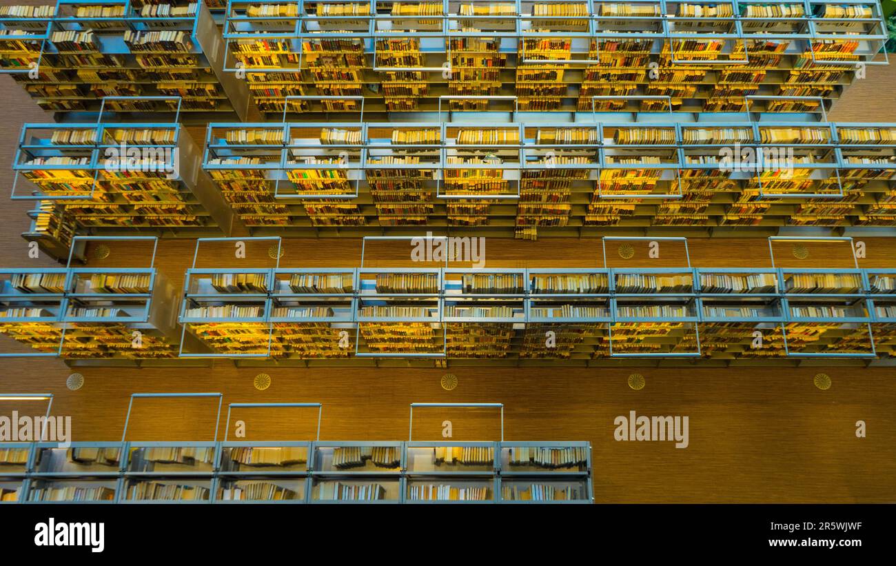 A large warehouse space with industrial shelving units filled with ...