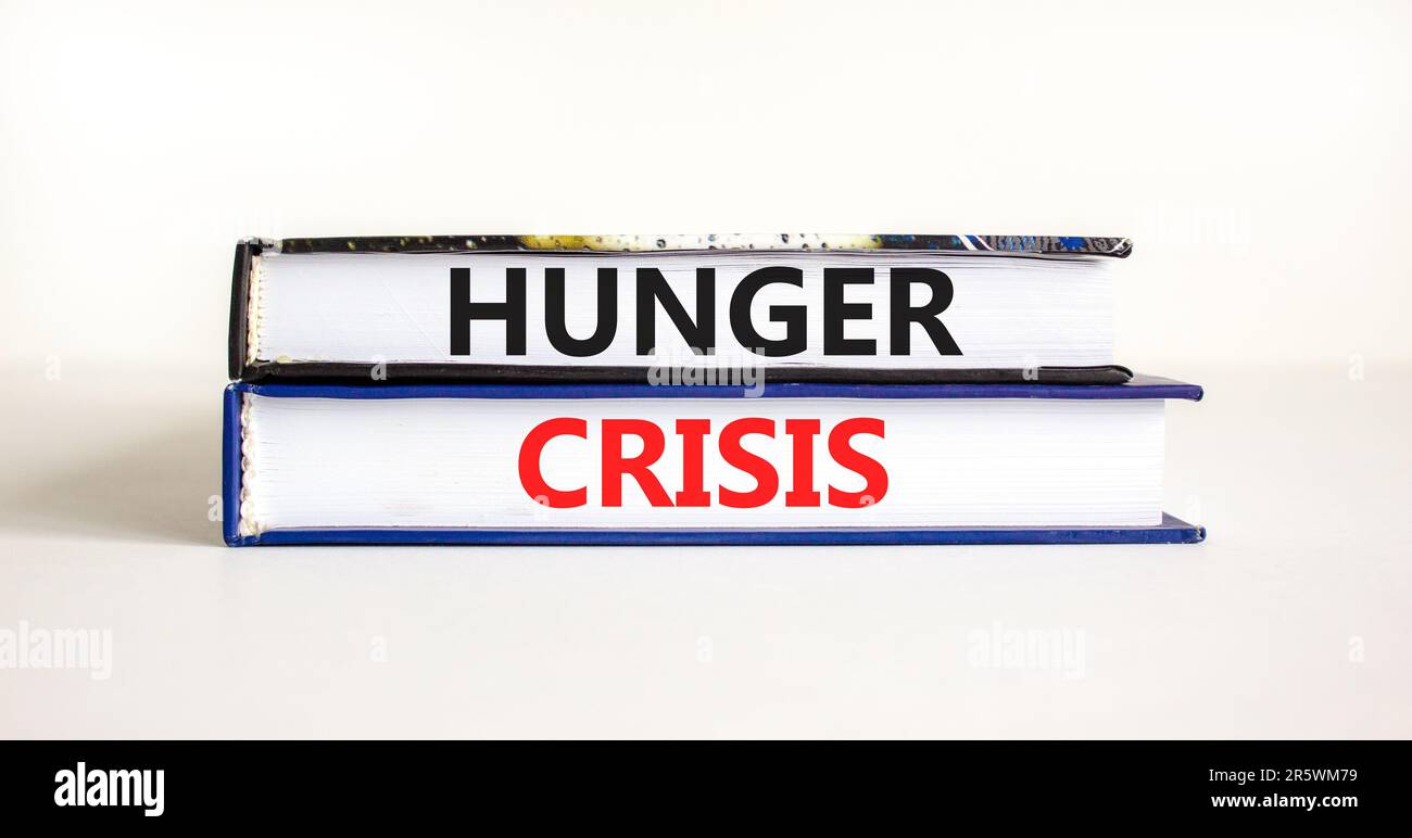 Hunger crisis symbol. Concept words Hunger crisis on beautiful books on ...