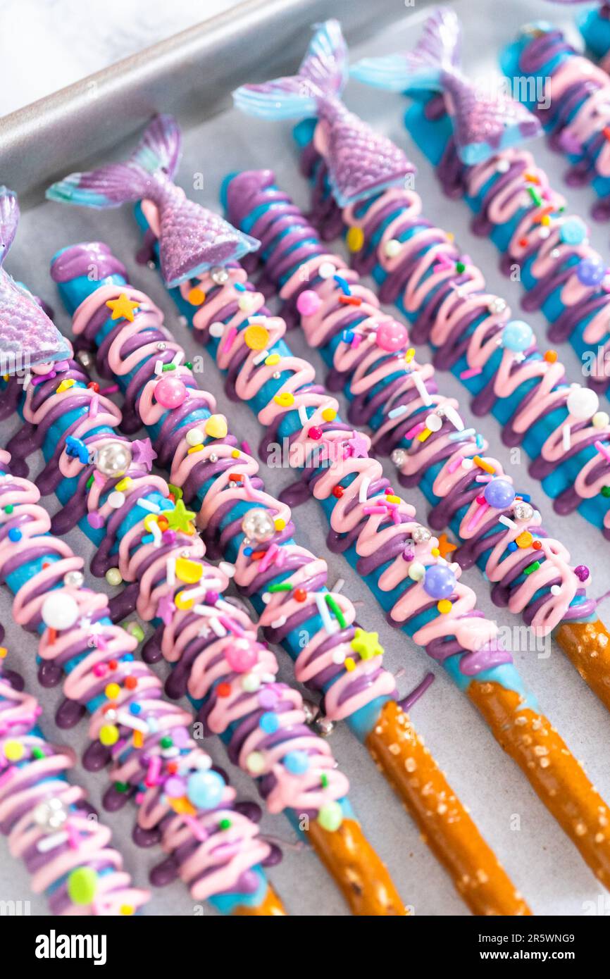 Mermaid chocolate pretzel rods Stock Photo - Alamy