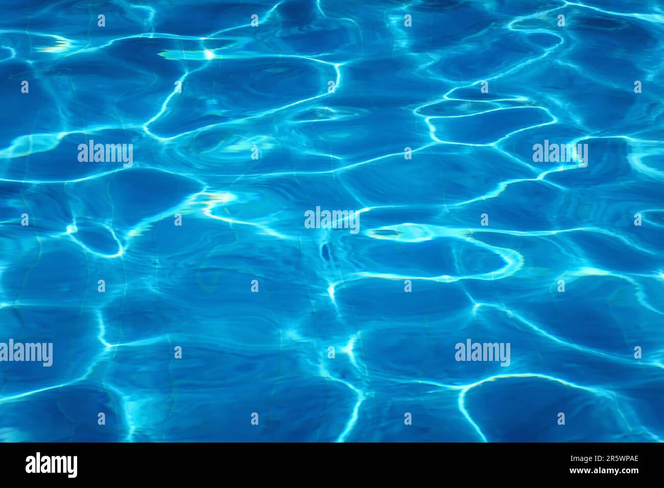 Swimming pool water sunny reflections, ripple water Stock Photo - Alamy