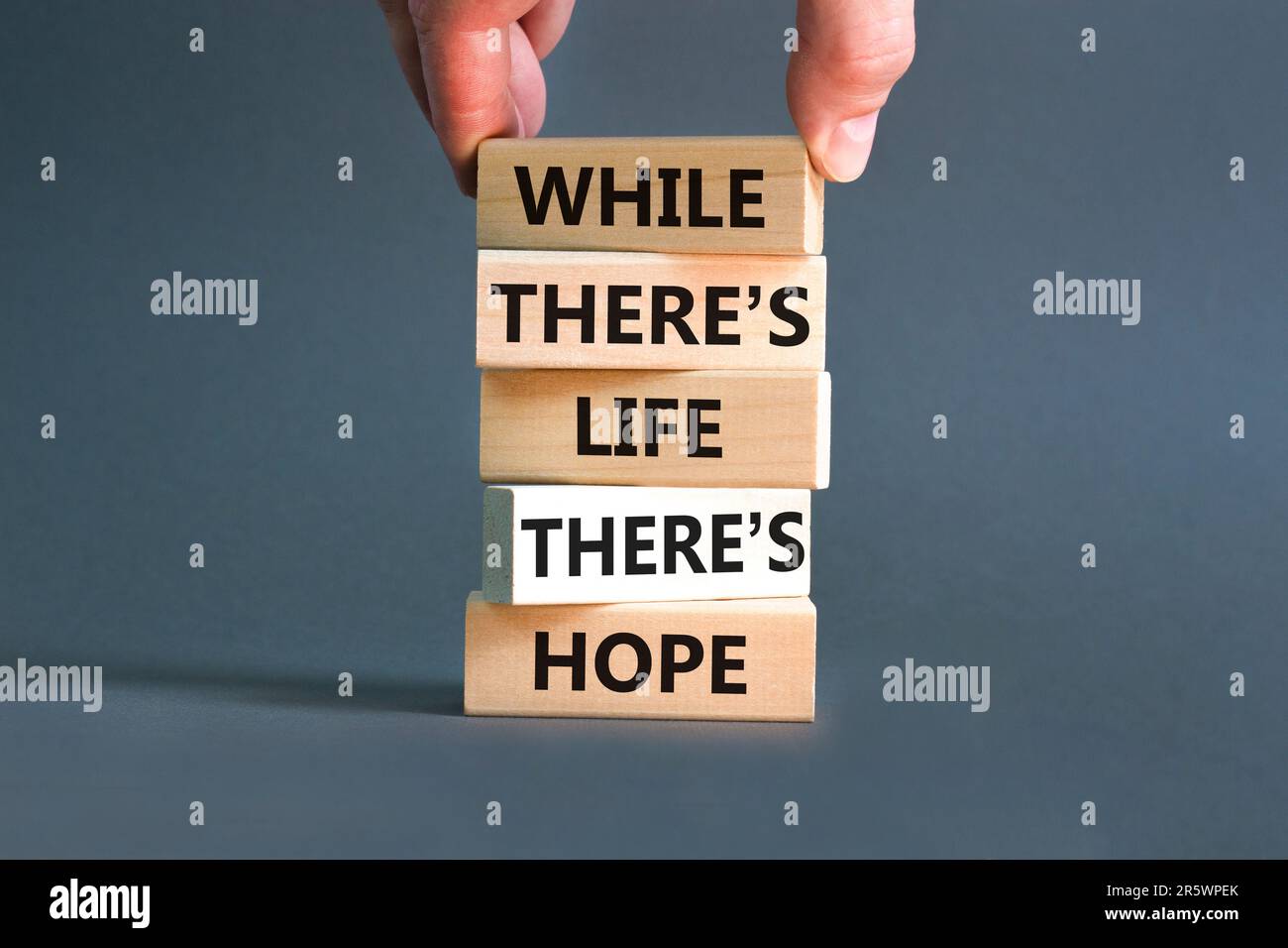 Life and hope symbol. Concept word While there is life there is hope on ...