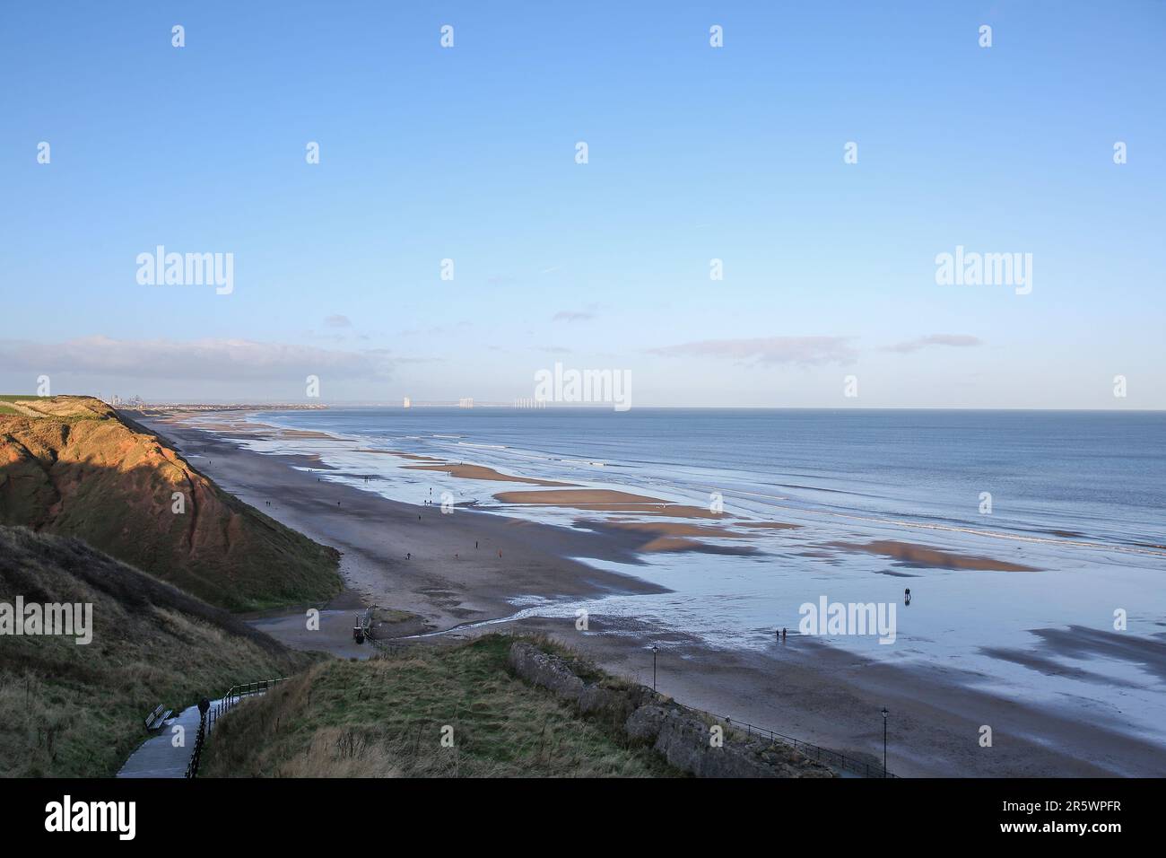 Saltburn Beach, North Yorkshire 2 January 2022 with walkers and paddle ...
