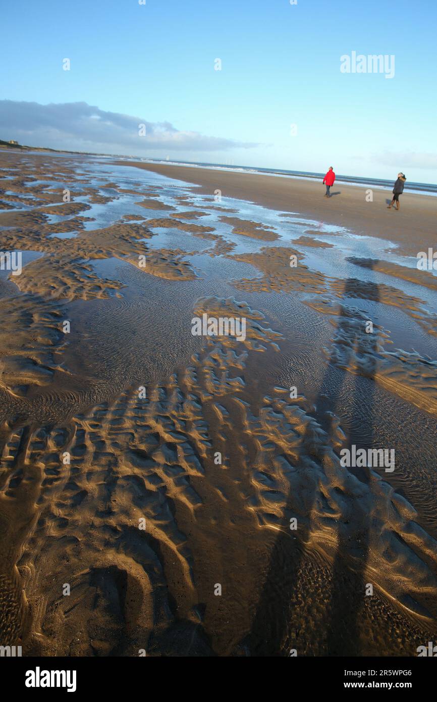Saltburn Beach, North Yorkshire 2 January 2022 with walkers and paddle ...