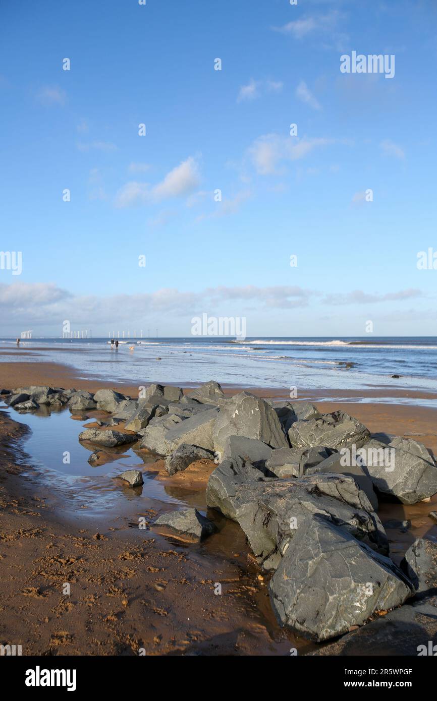 Saltburn Beach, North Yorkshire 2 January 2022 with walkers and paddle ...