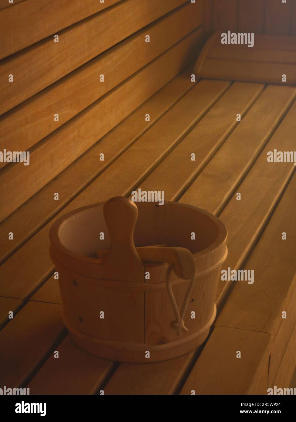 Wooden sauna interior wood fired sauna with bucket Stock Photo - Alamy