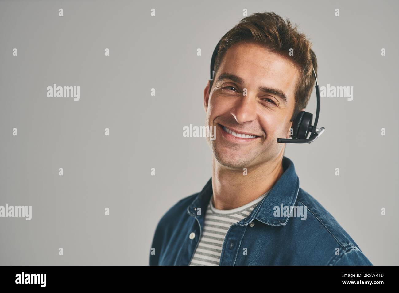 Providing world class customer support to all. Studio portrait of a ...