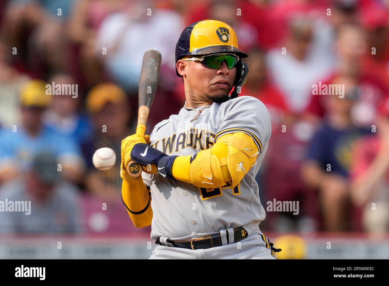 Milwaukee Brewers' William Contreras (24) avoids a high pitch during an ...