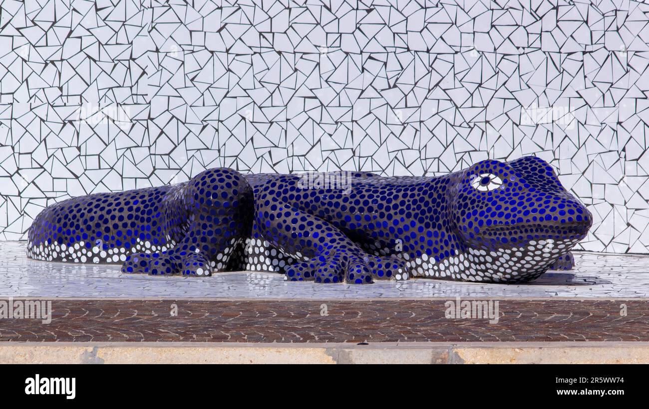 Large Lizard statue in front of Cafe del Mar Qawra Malta Stock Photo ...
