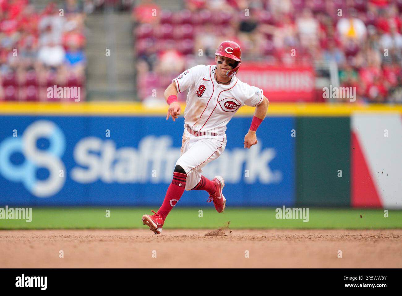 Cincinnati Reds' Matt McLain (9) rounds the bases during a baseball ...