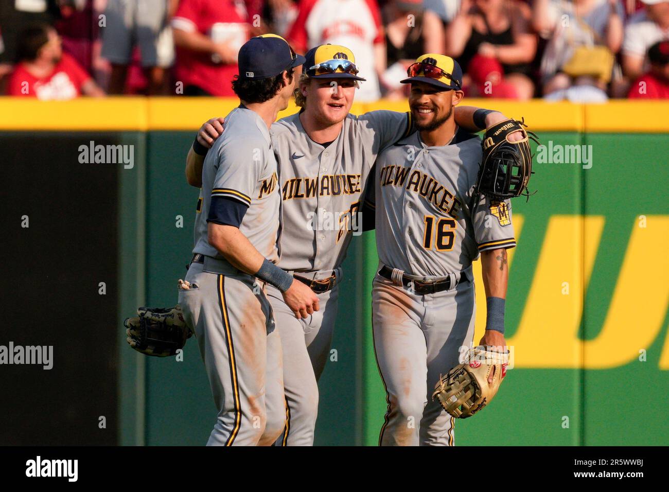 Milwaukee Brewers' Christian Yelich, left, Joey Wiemer (28) and Blake ...