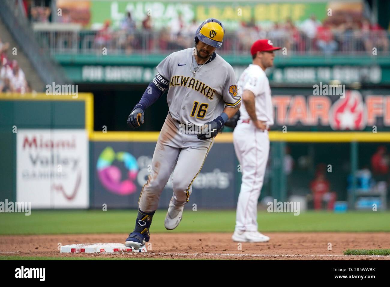 Milwaukee Brewers' Blake Perkins (16) rounds the bases after hitting a ...