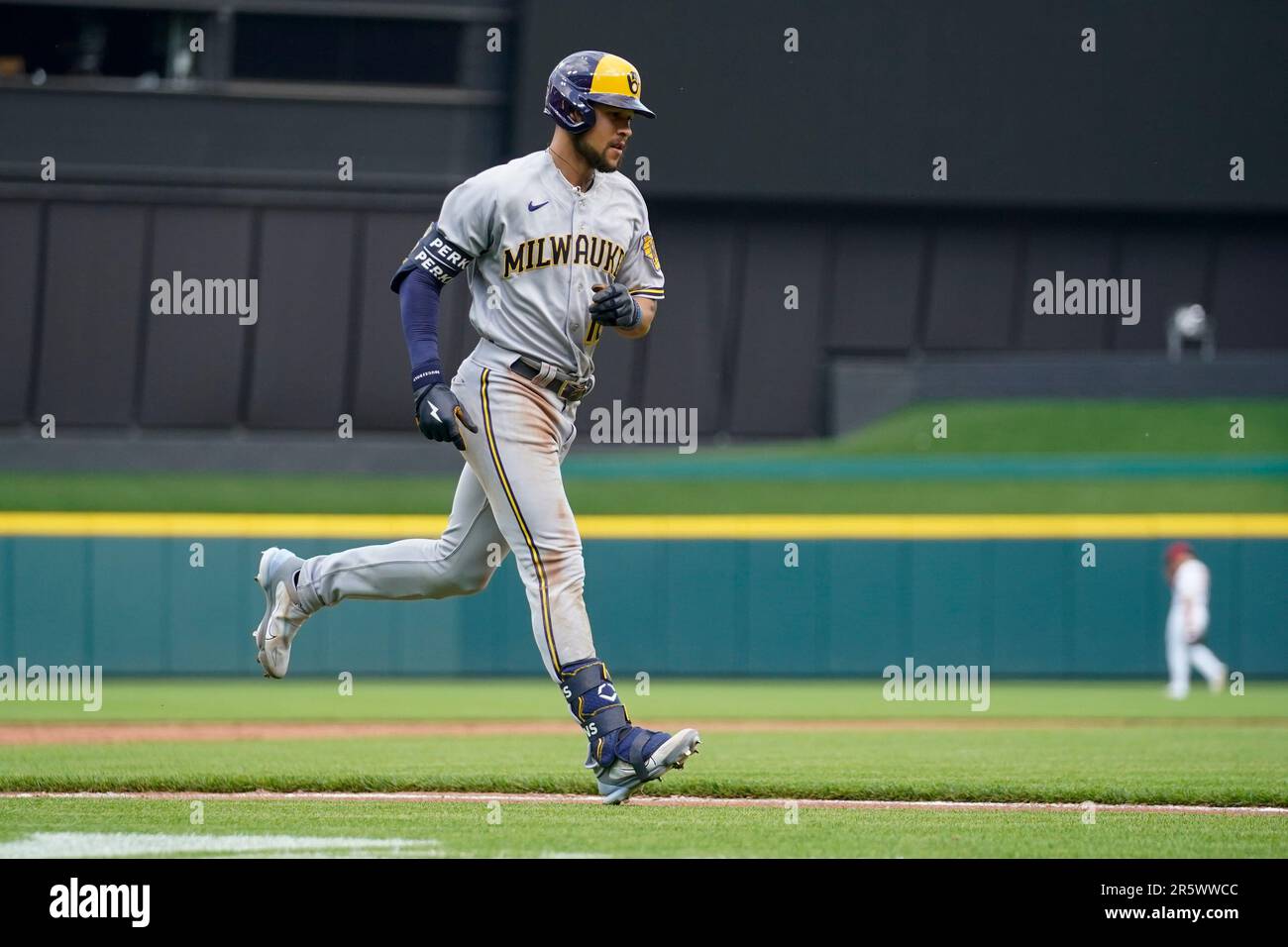Milwaukee Brewers' Blake Perkins rounds the bases after hitting a grand ...