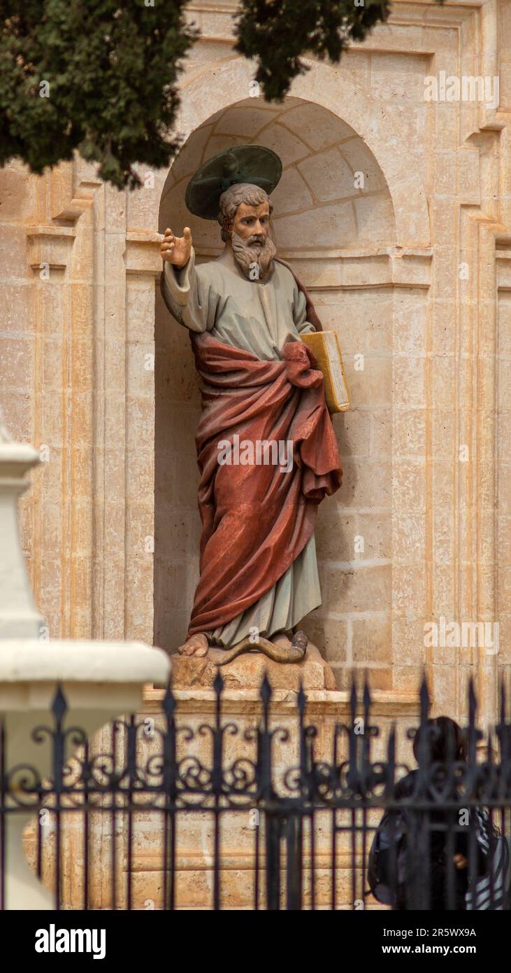 A statue of Saint Paul at the entrance of the iconic Sanctuary of Our ...