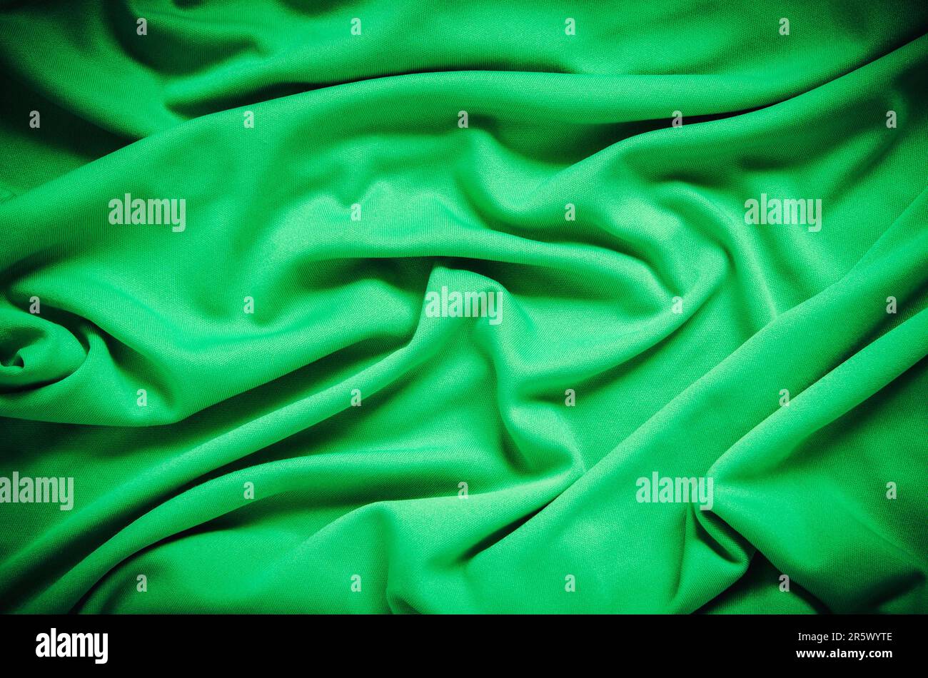 Green wrinkled fabric texture. Close-up of soft cotton cloth, may be ...