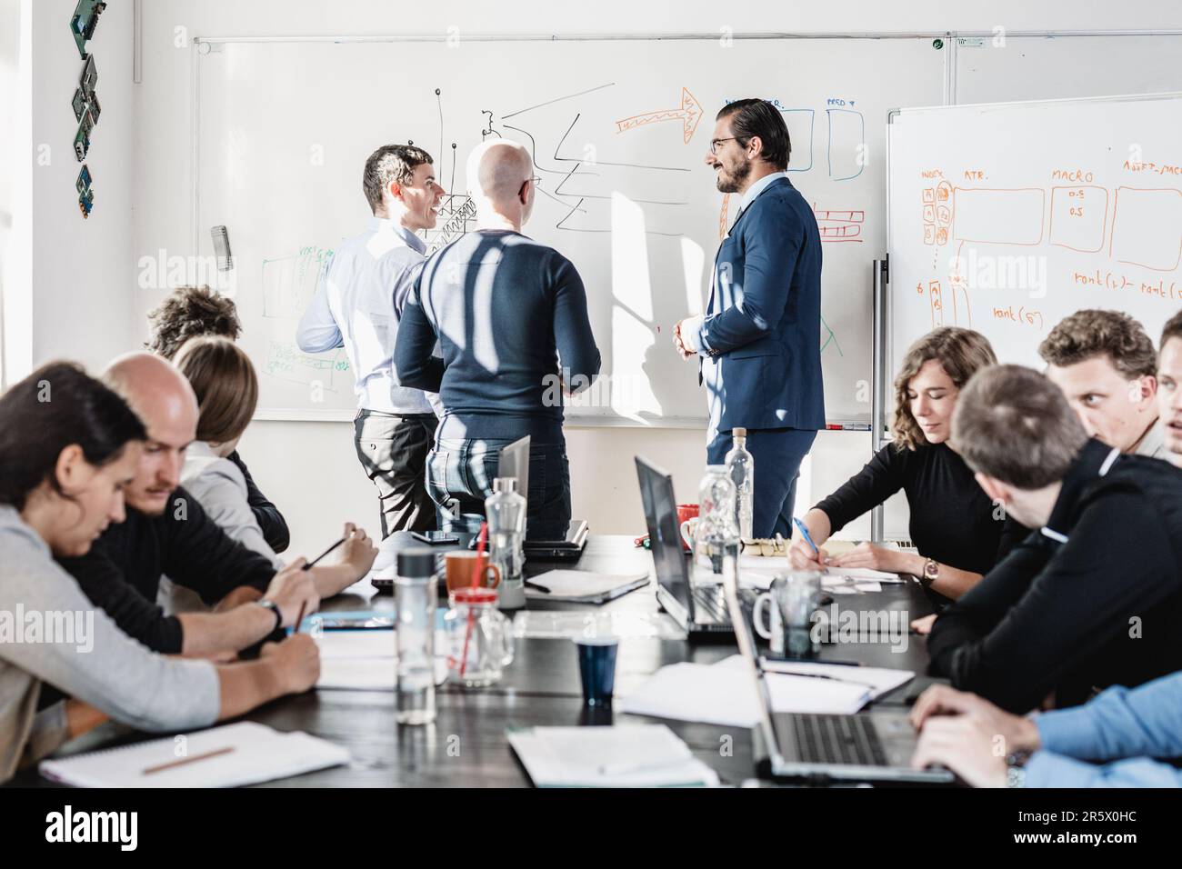 Relaxed informal IT business startup company meeting. Team leaders ...