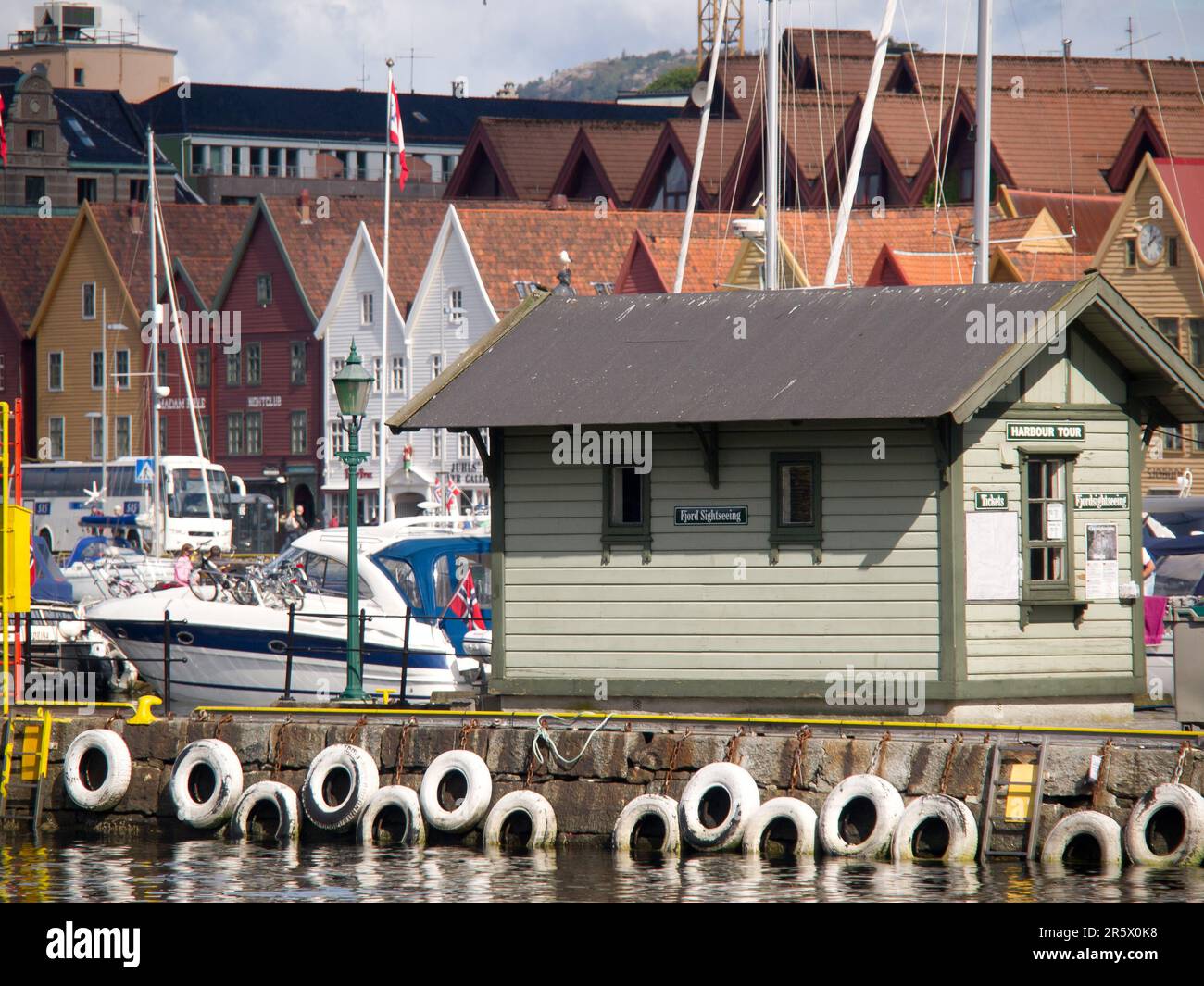 A tranquil gray cottage with a stunning harbor view, boasting multiple ...