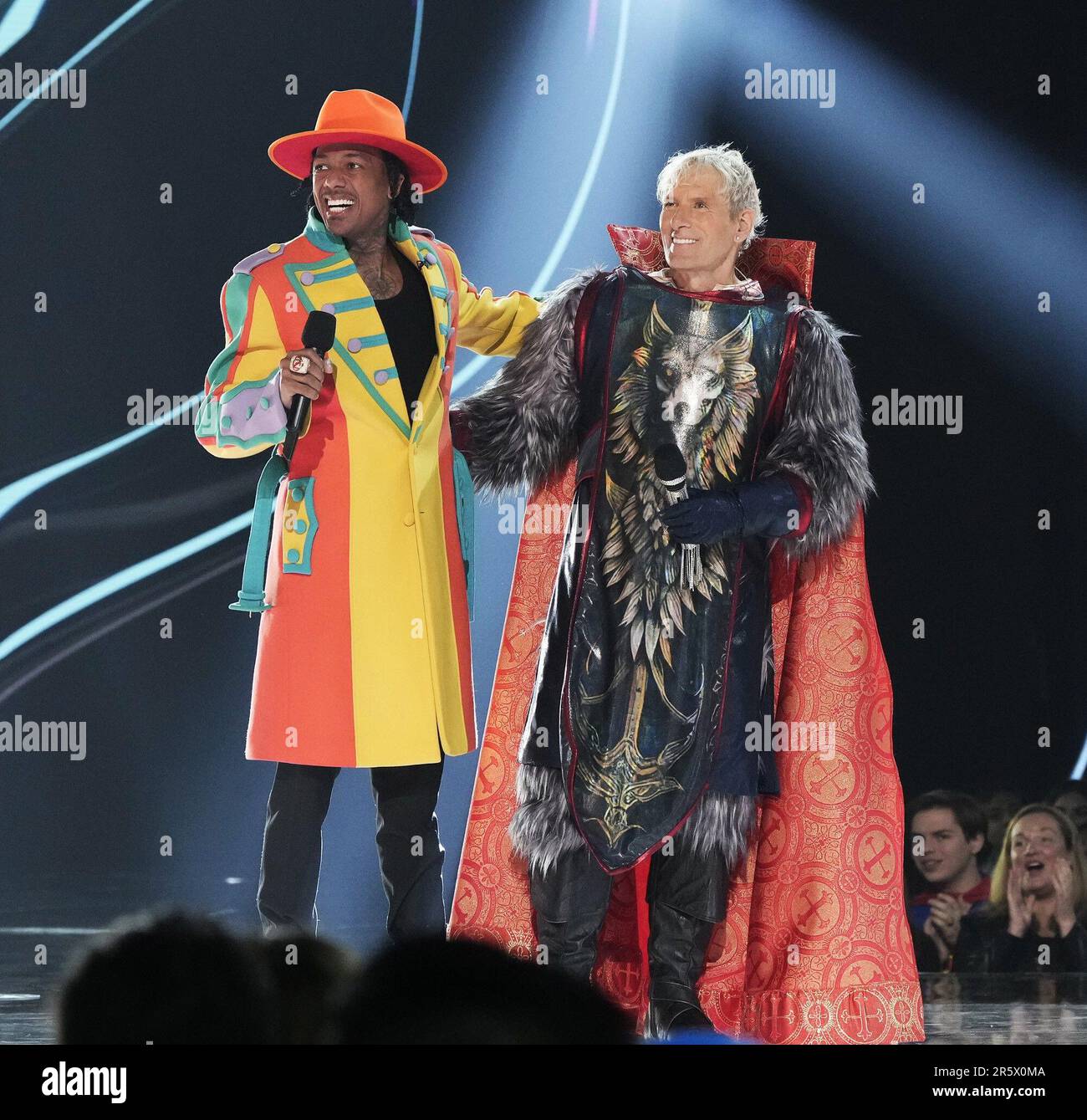 THE MASKED SINGER, from left: host Nick Cannon, Michael Bolton, DC ...