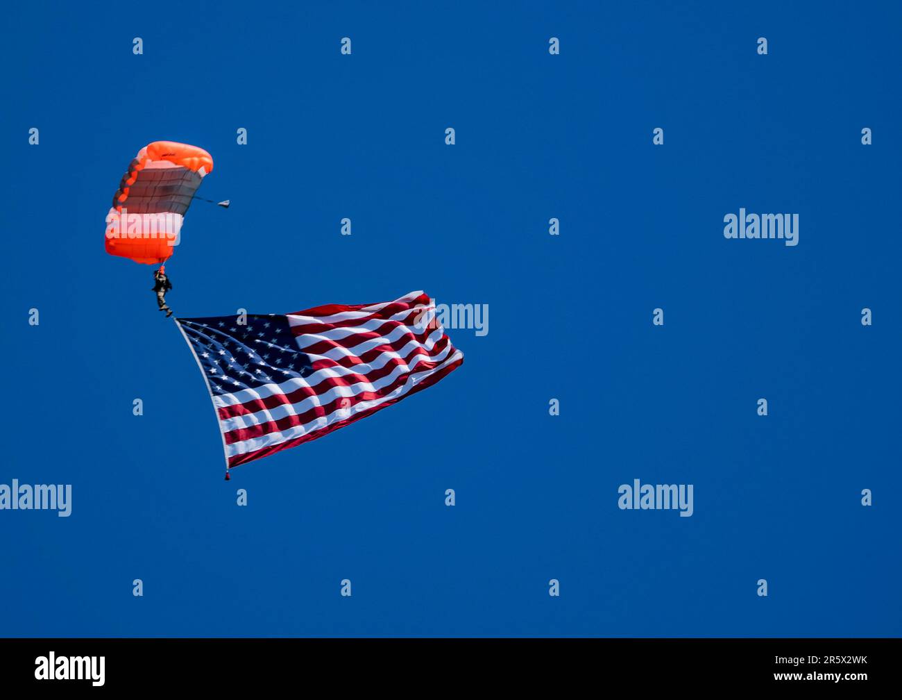 A parachutist kicks off the military free fall airborne demonstration ...