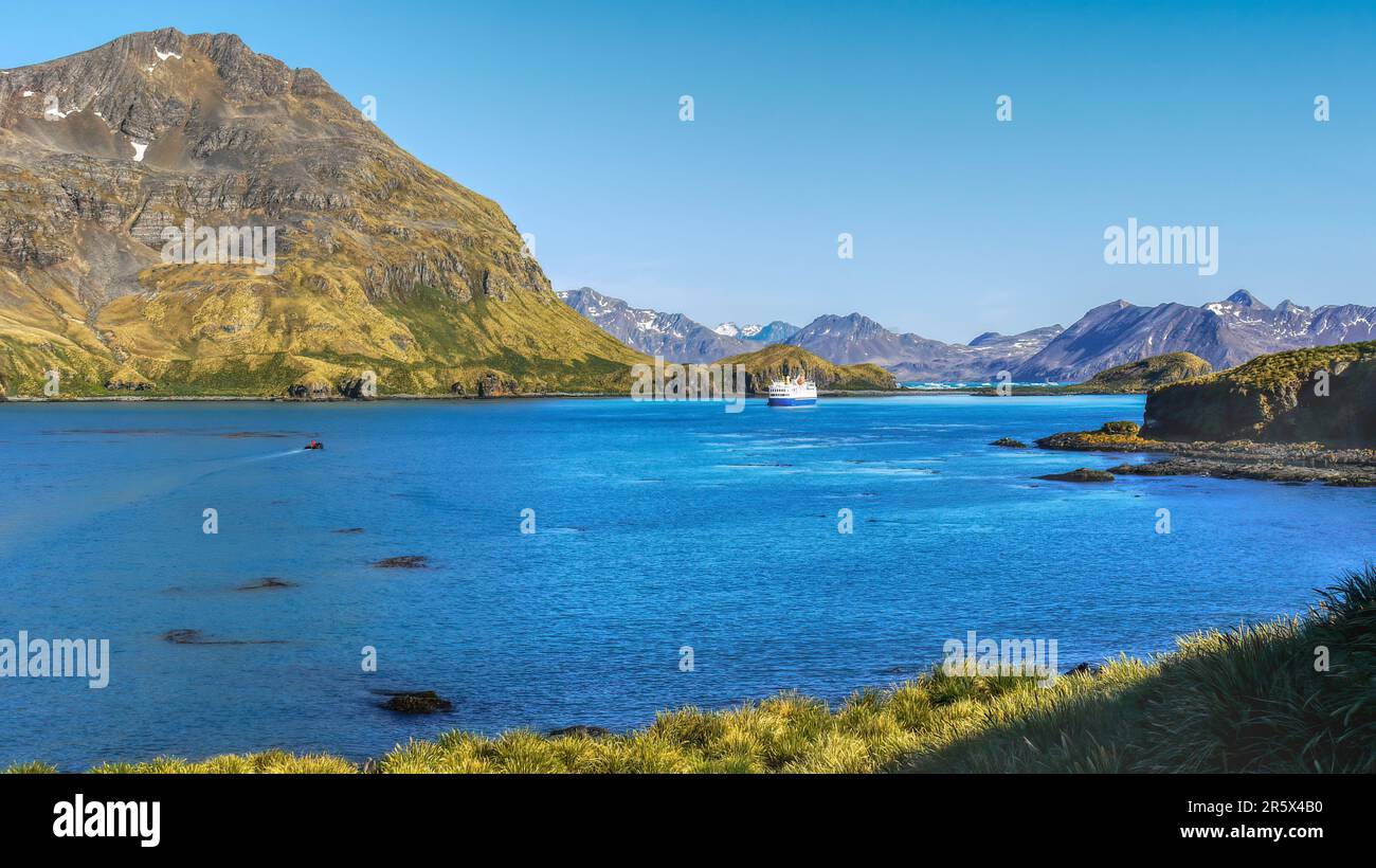 A beautiful landscape, with a cruise ship anchored in Maiviken Cove on ...