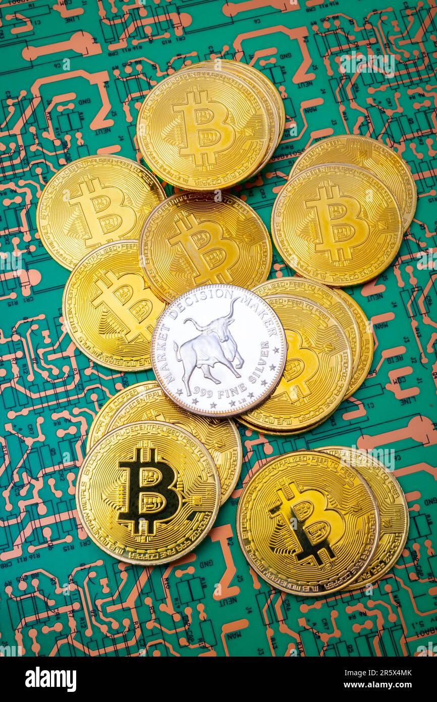 Pure Silver Coin And Bit Coins On Circuit Board Still Life. Stock ...