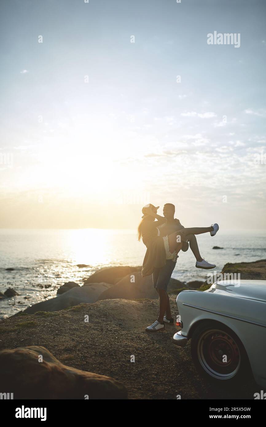 Youll find us where the sun kisses the ocean. a young couple making a ...