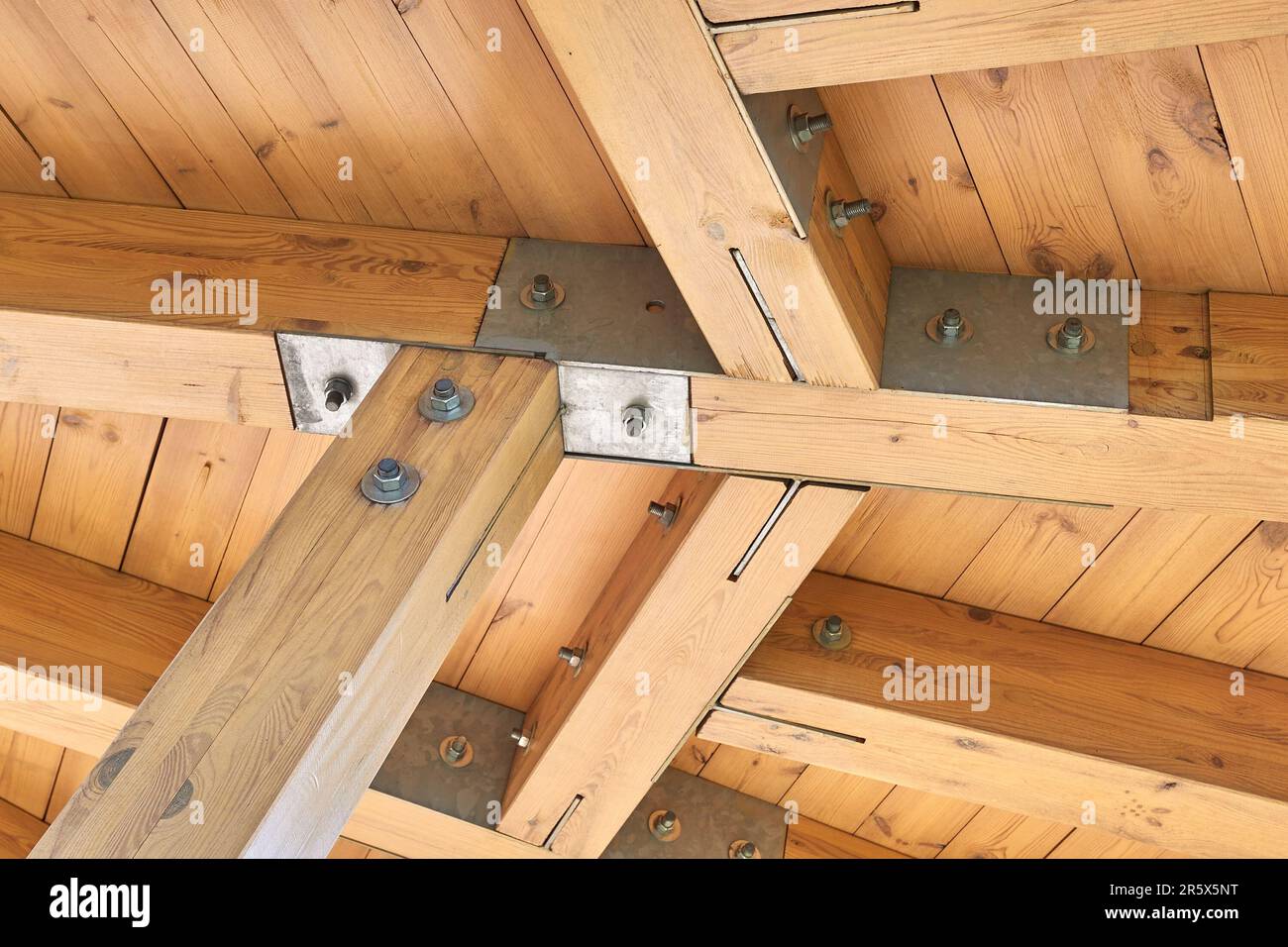 Wooden roof lumber beam structure Stock Photo - Alamy