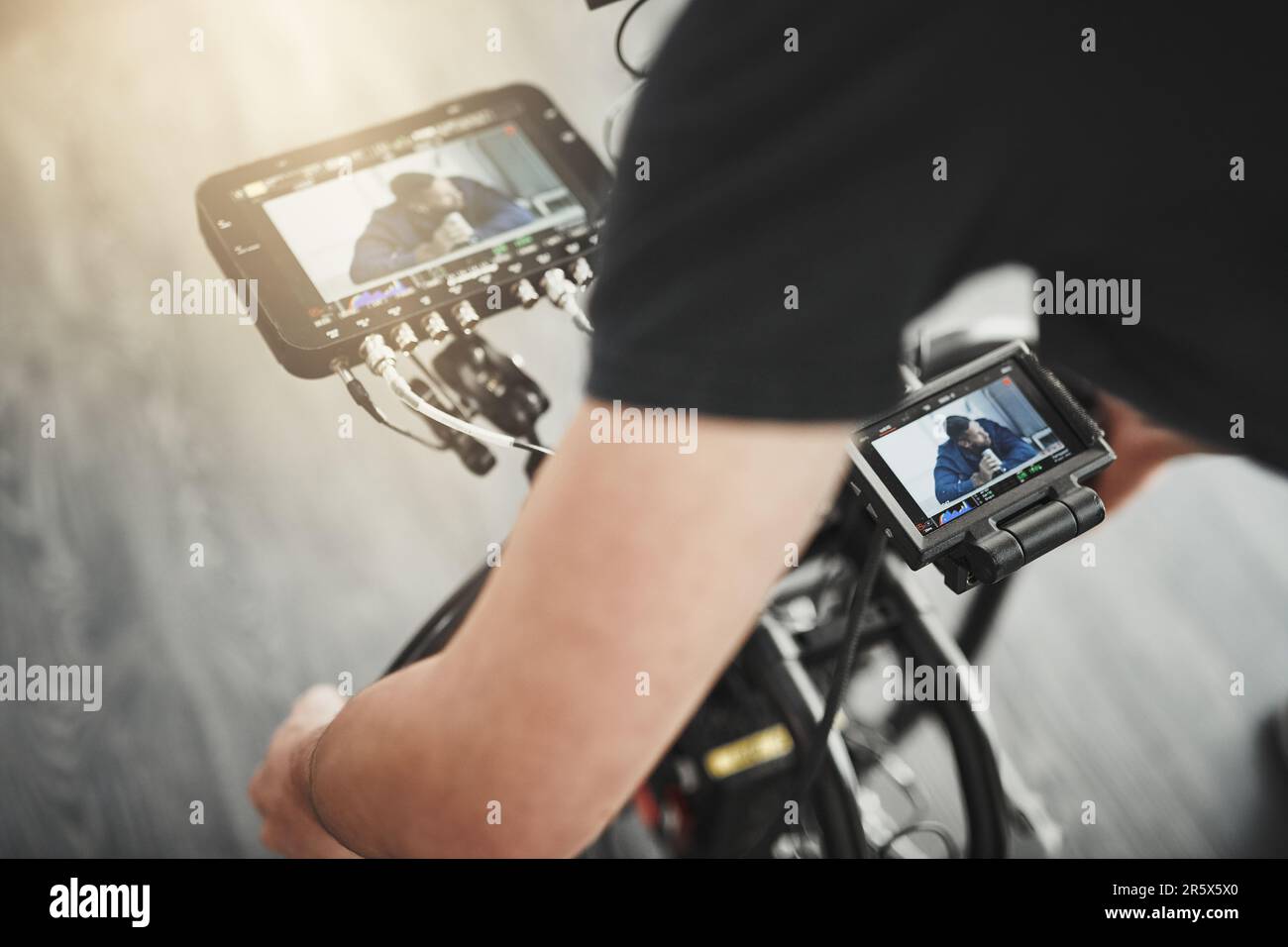 Time for some closer shots. Behind the scenes over the shoulder shot of ...