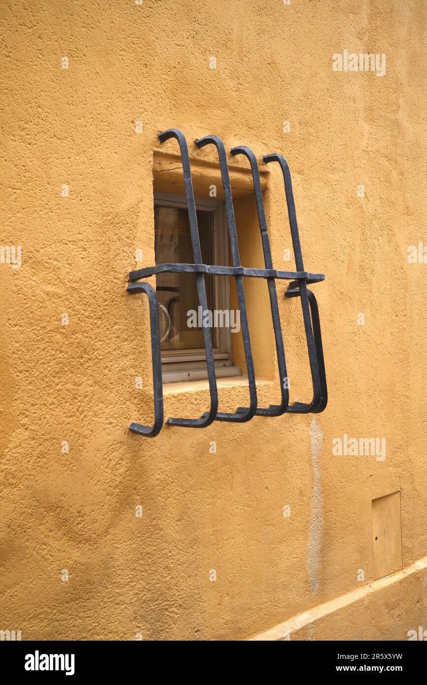 Iron bars around window in the old town of Aix En Provence France Stock ...