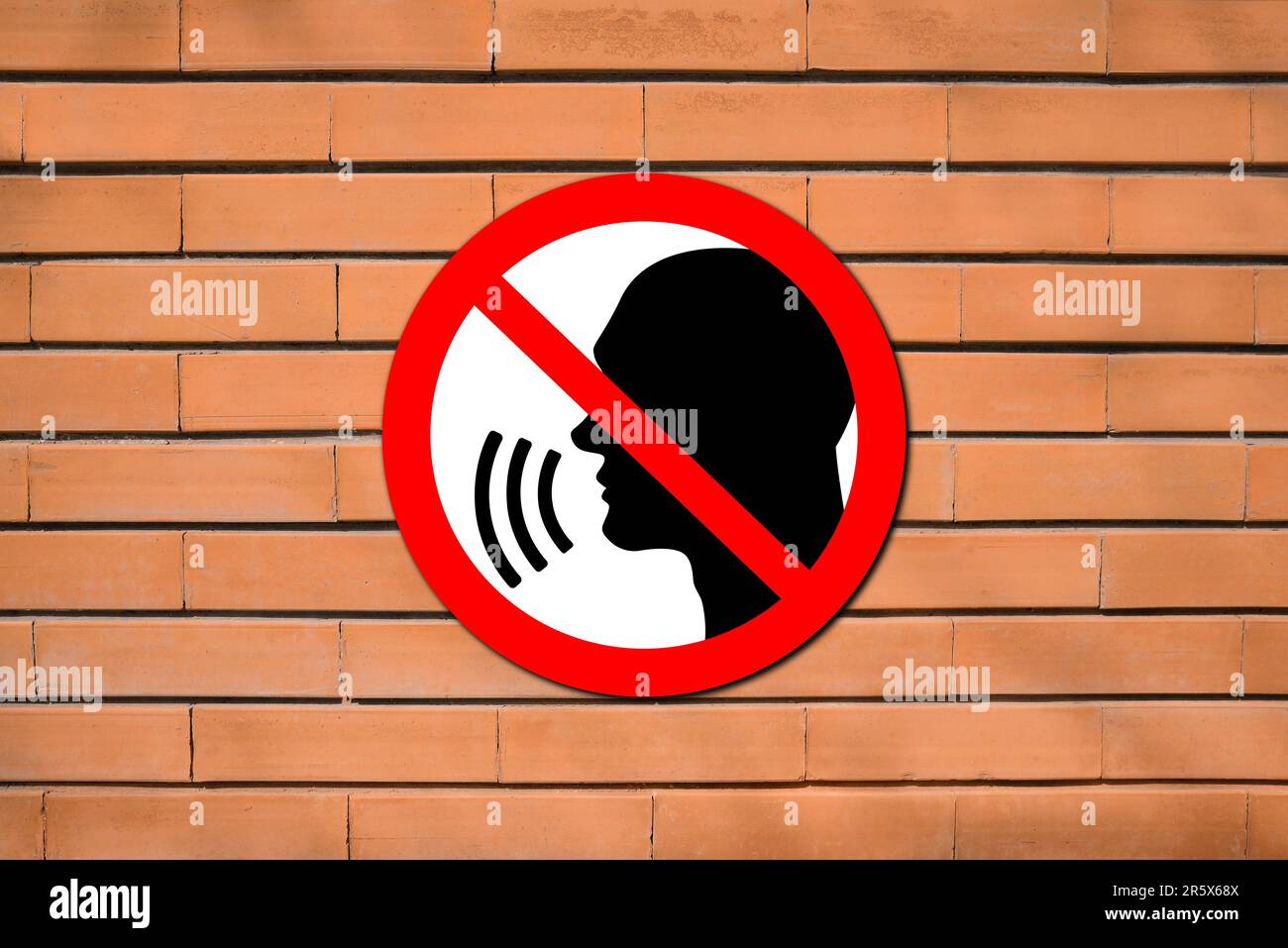 Quiet Please. Prohibition sign with human head image red brick wall ...