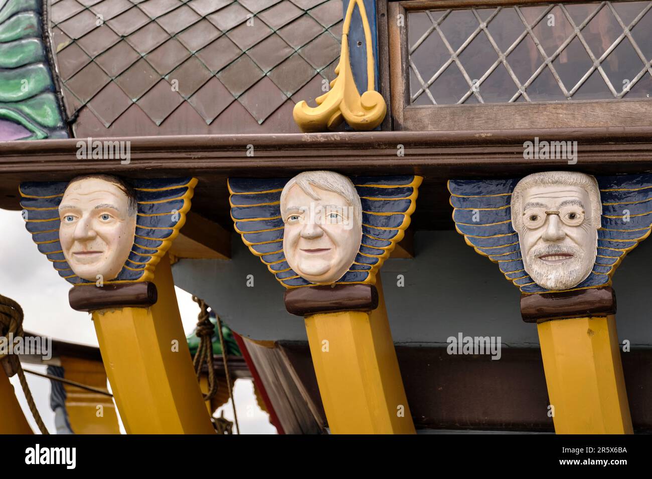 Carved busts of elected officials and benefactors adorn the replica ...