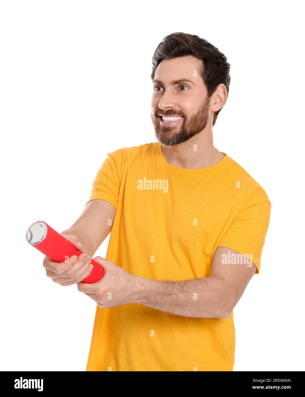 Happy man with party popper on white background Stock Photo - Alamy