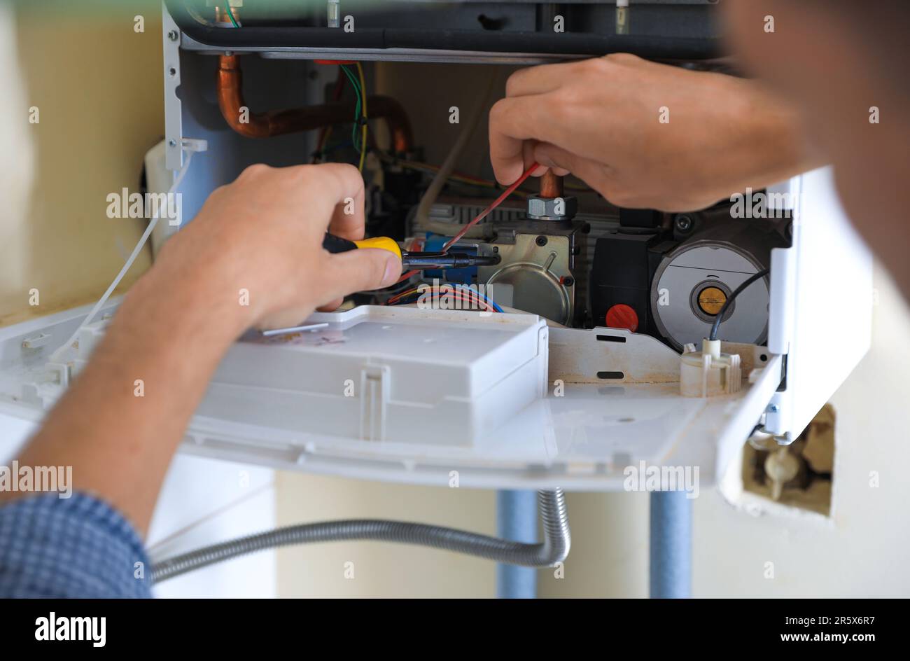 Man boiler repairing hi-res stock photography and images - Alamy
