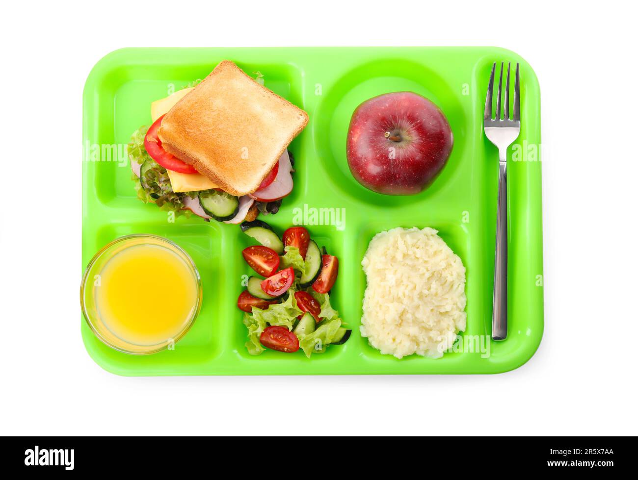 Green tray with tasty food and juice on white background, top view. School lunch Stock Photo - Alamy