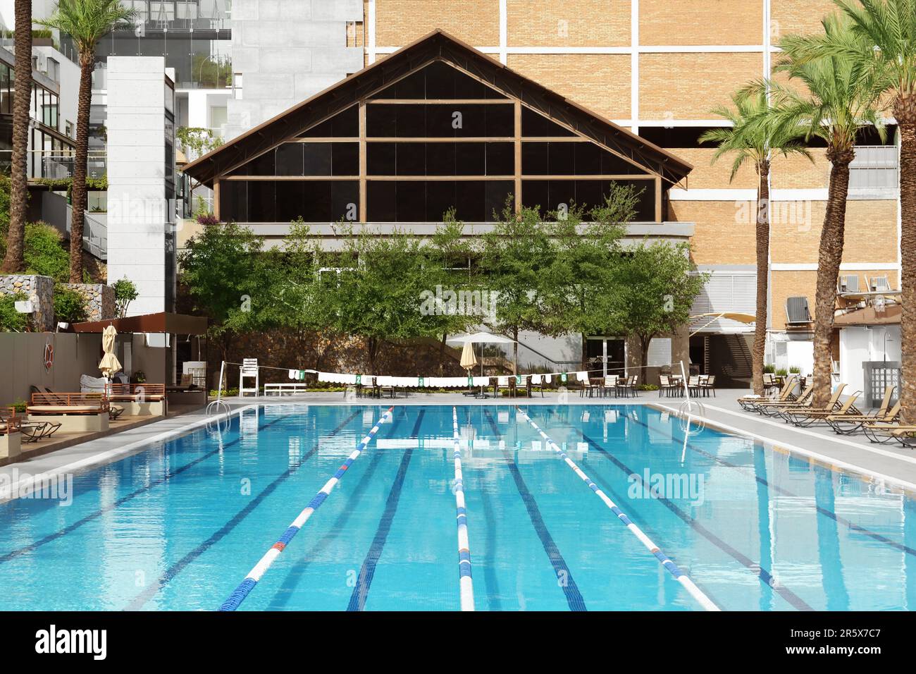 View on swimming pool and building at luxury resort Stock Photo - Alamy