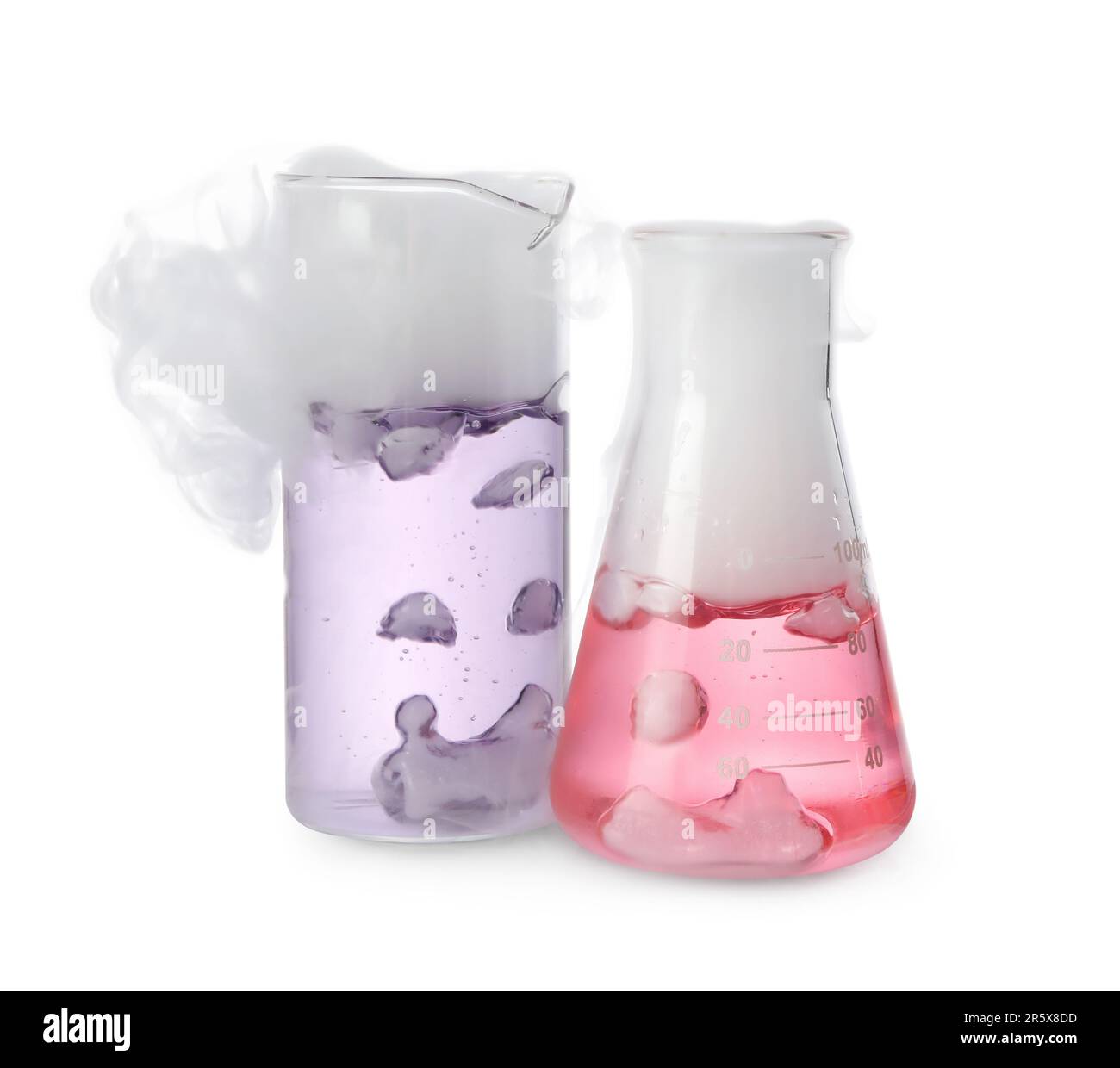 Laboratory glassware with colorful liquids and steam isolated on white ...