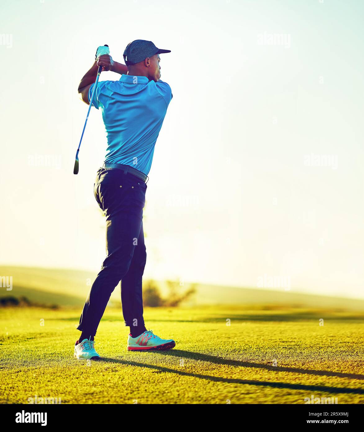 The right follow through makes all the difference. a young man playing ...