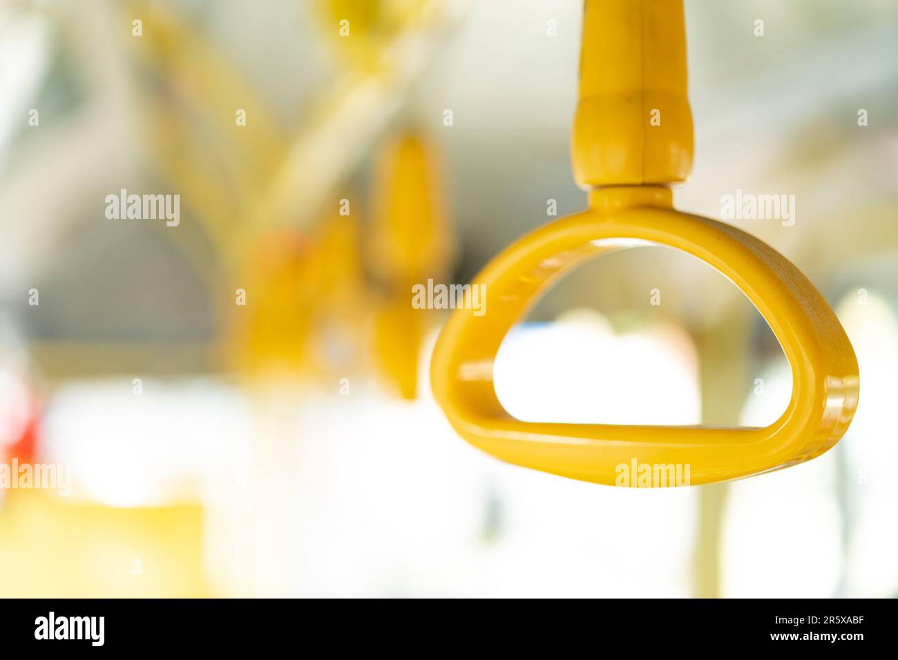 handgrip inside a bus Stock Photo - Alamy