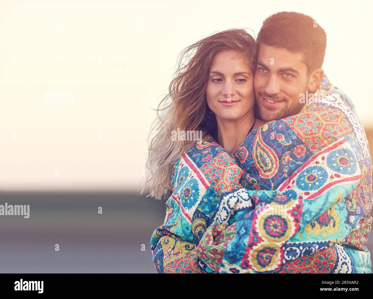 Summer love is everything. an affectionate young couple at the beach ...