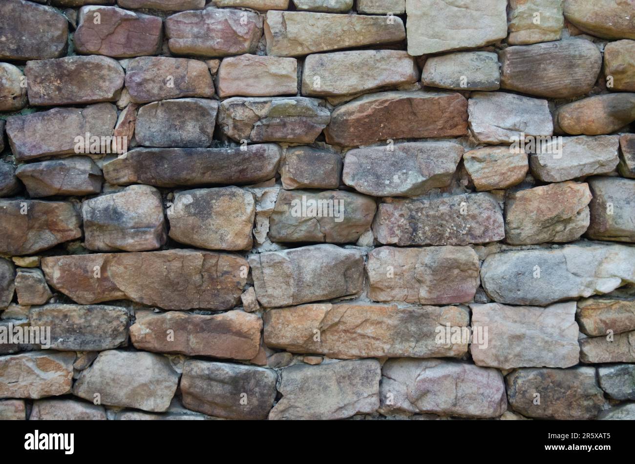 Stone rock wall with beautiful pattern for background. Texture and ...