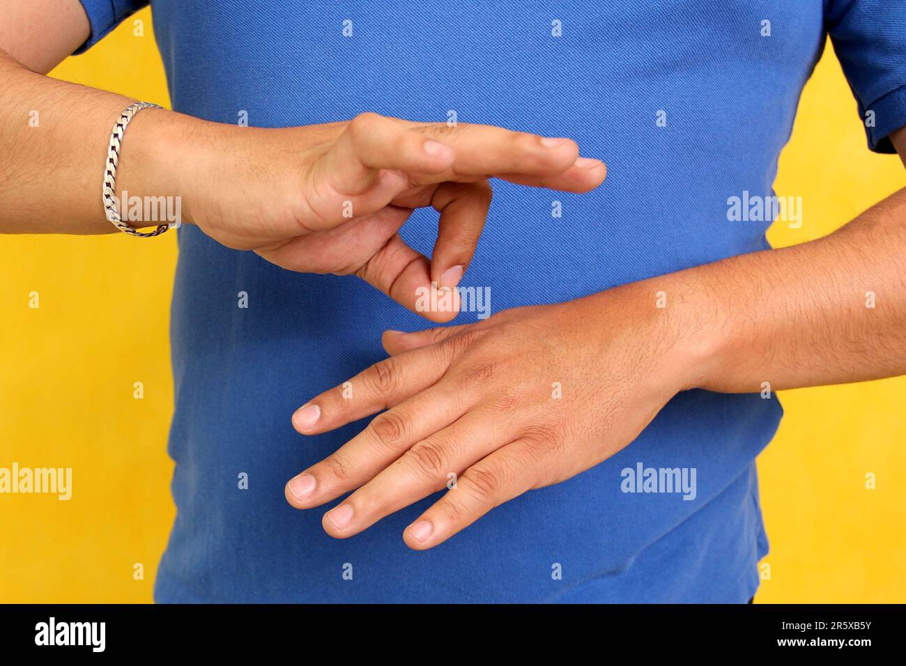 Hands of a Latino man makes sign language, expression and gesture ...