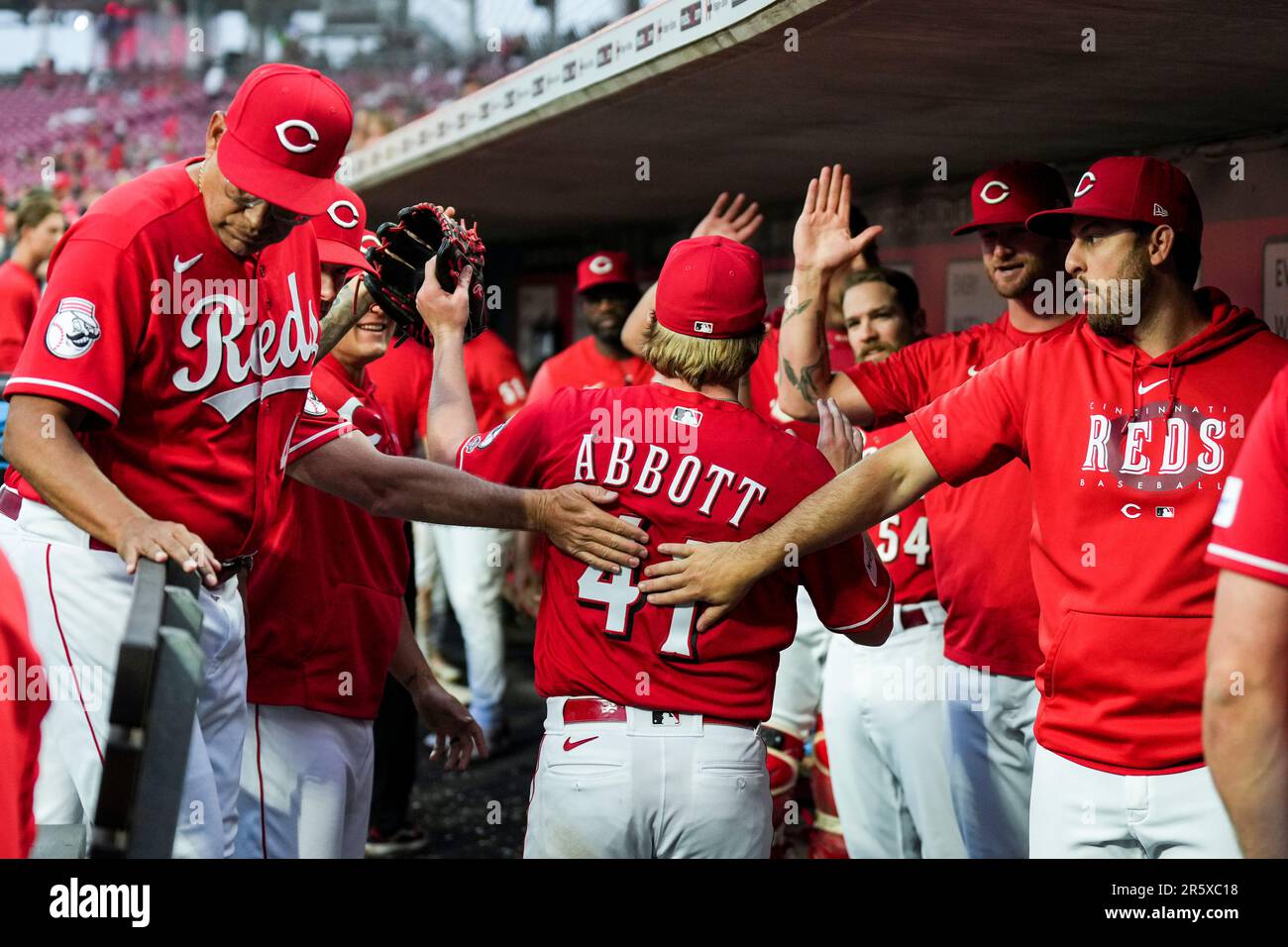 Cincinnati Reds' Andrew Abbott, center, high-fives teammates in the ...