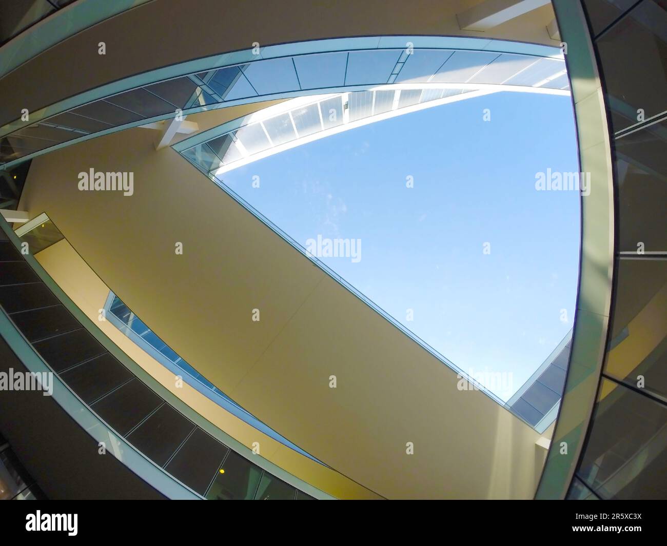 Image from below of a modern architecture building with a complex shape ...