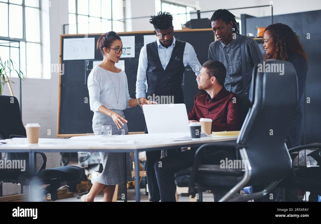 I have the best idea ever. a group of creative businesspeople meeting ...