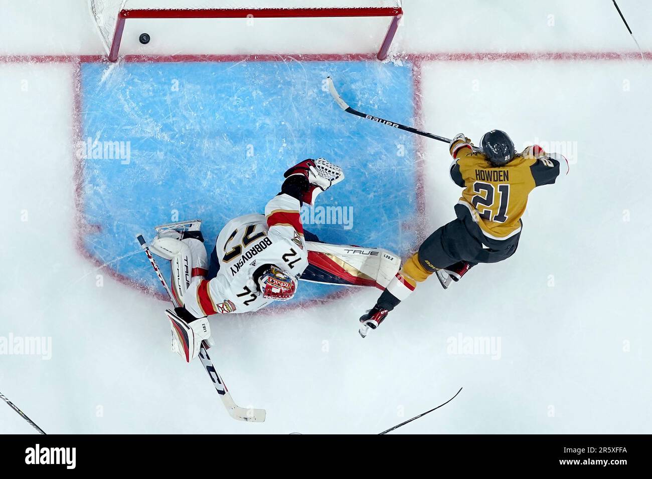 Vegas Golden Knights center Brett Howden (21) scores around Florida ...
