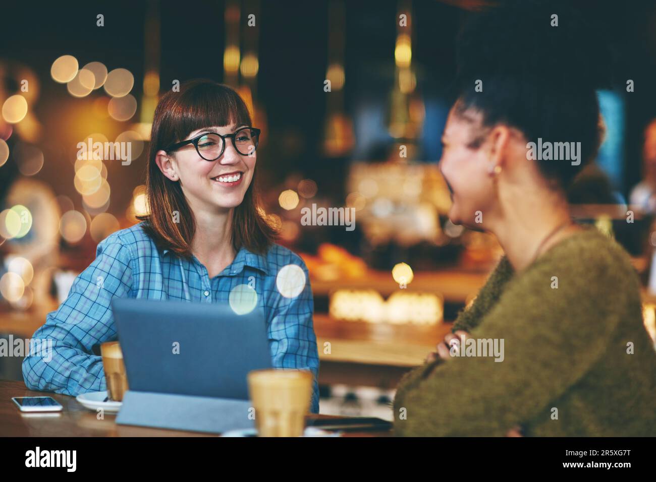 Coffee and friendship makes for the best blend. two young friends ...